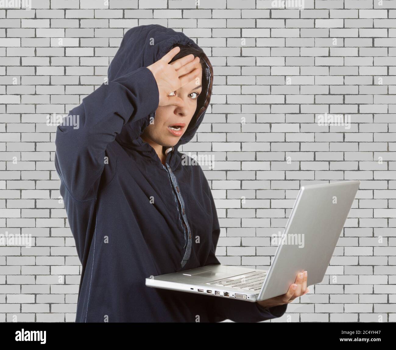 Catched Criminal Woman Hacker Wearing Hood On Using a Laptop in front ...