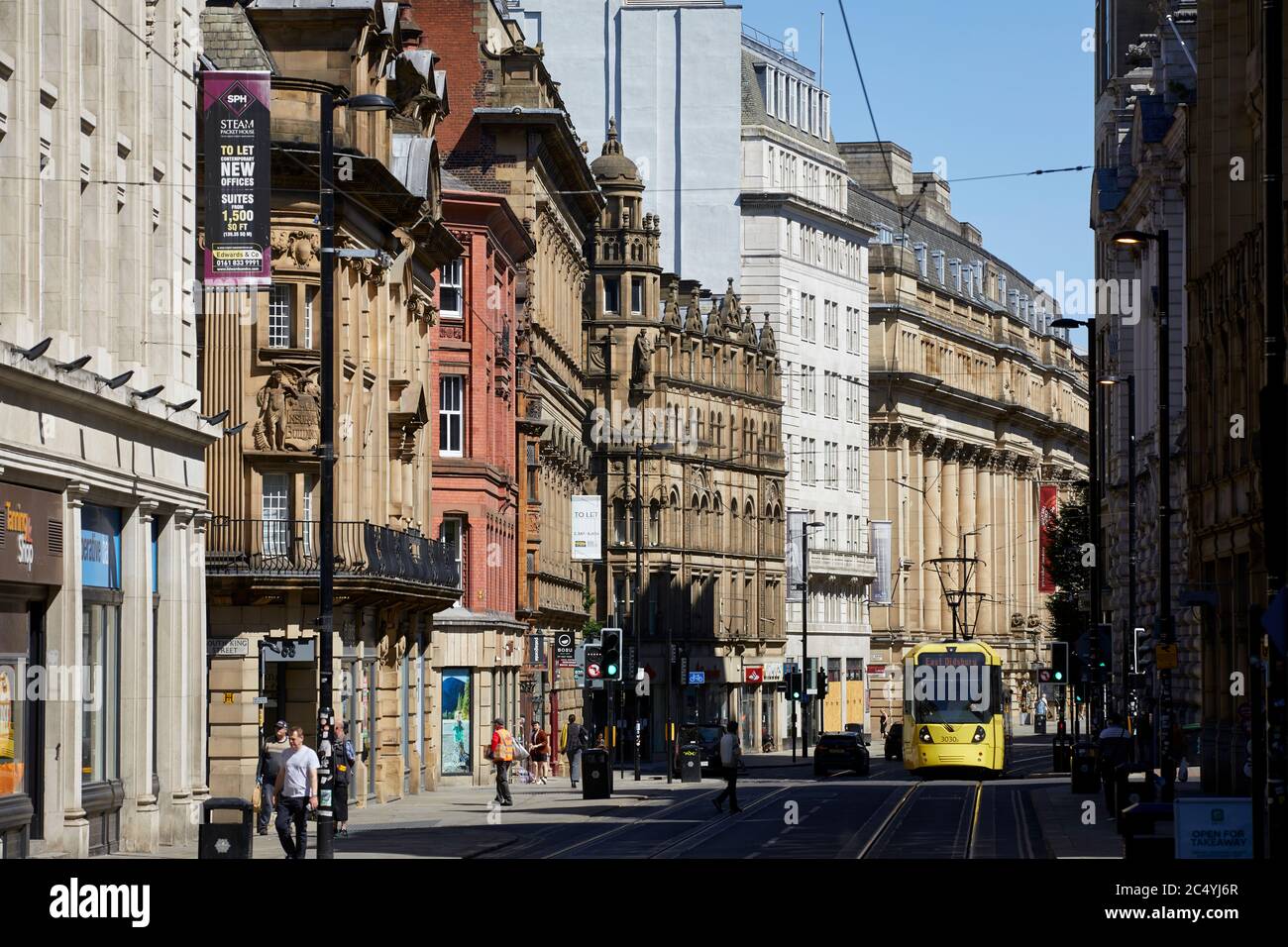 Manchester city centre Cross Street with a Metrolink tram winding ...