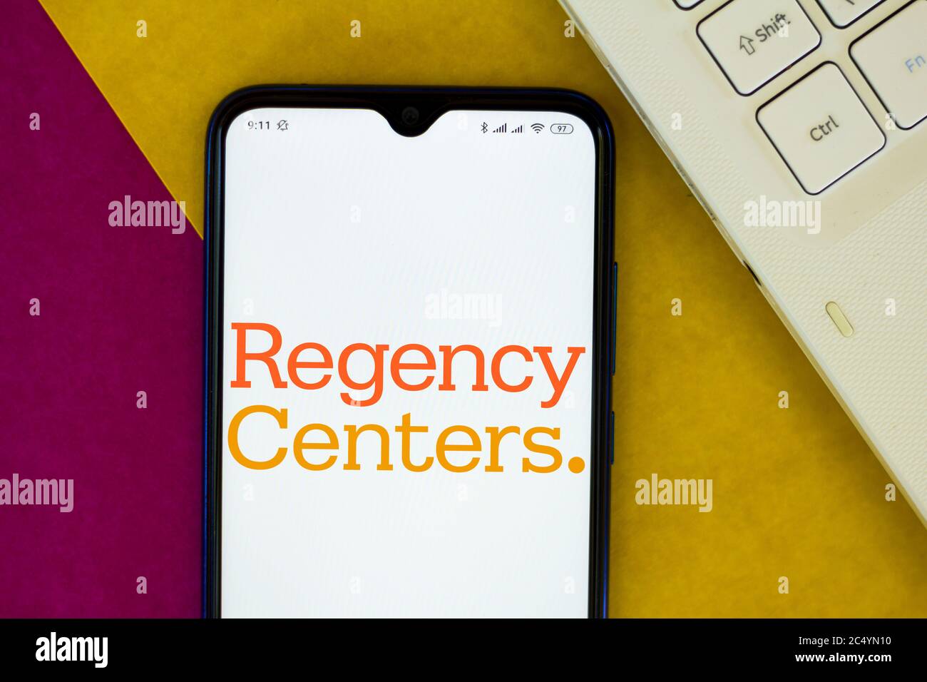 In this photo illustration the Regency Centers Corporation logo seen ...