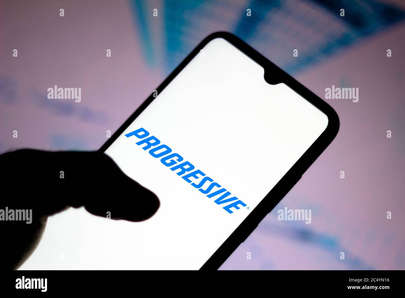 In this photo illustration the Progressive Corporation logo seen ...