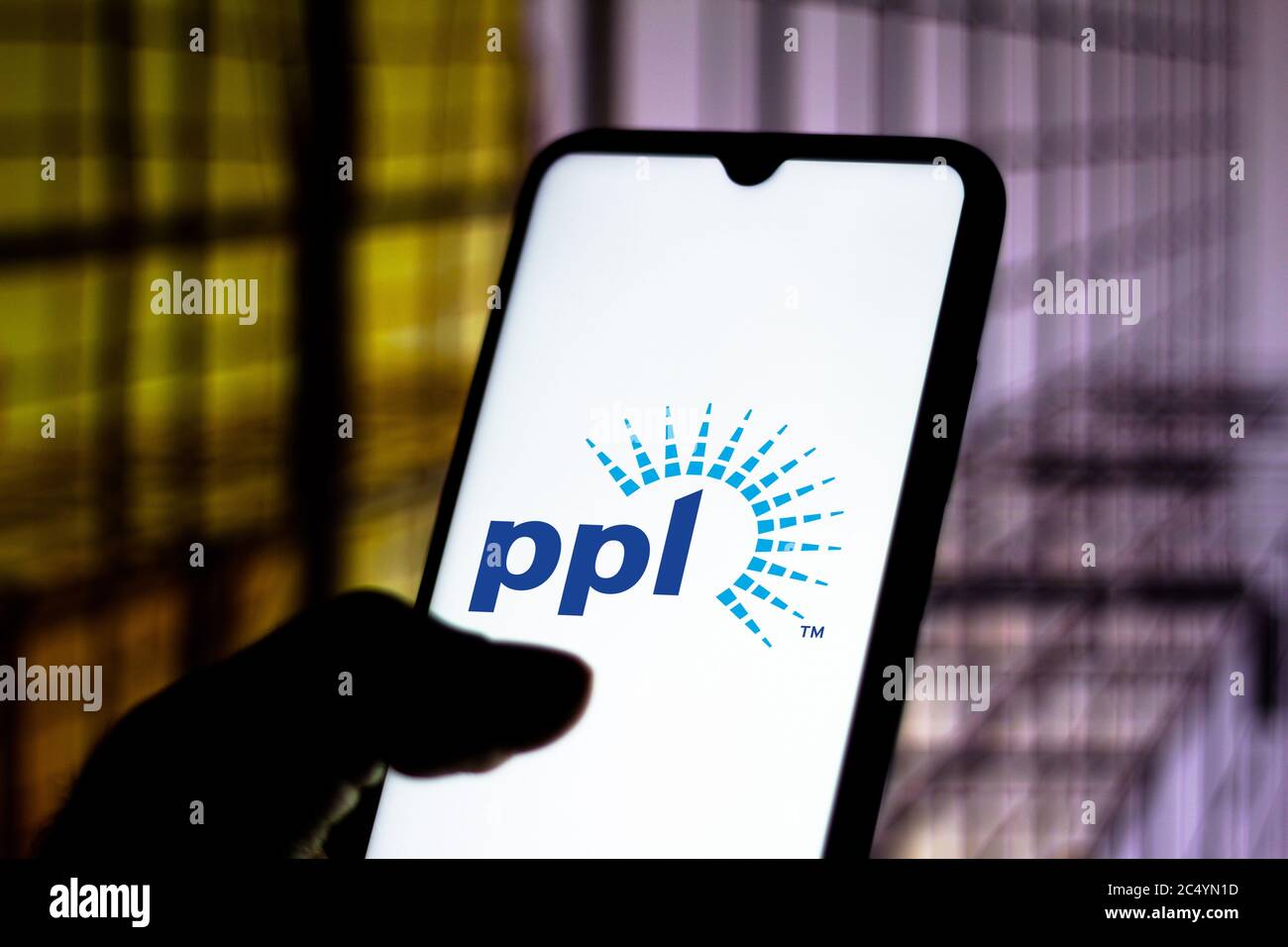 In this photo illustration the PPL Corporation logo seen displayed on a ...