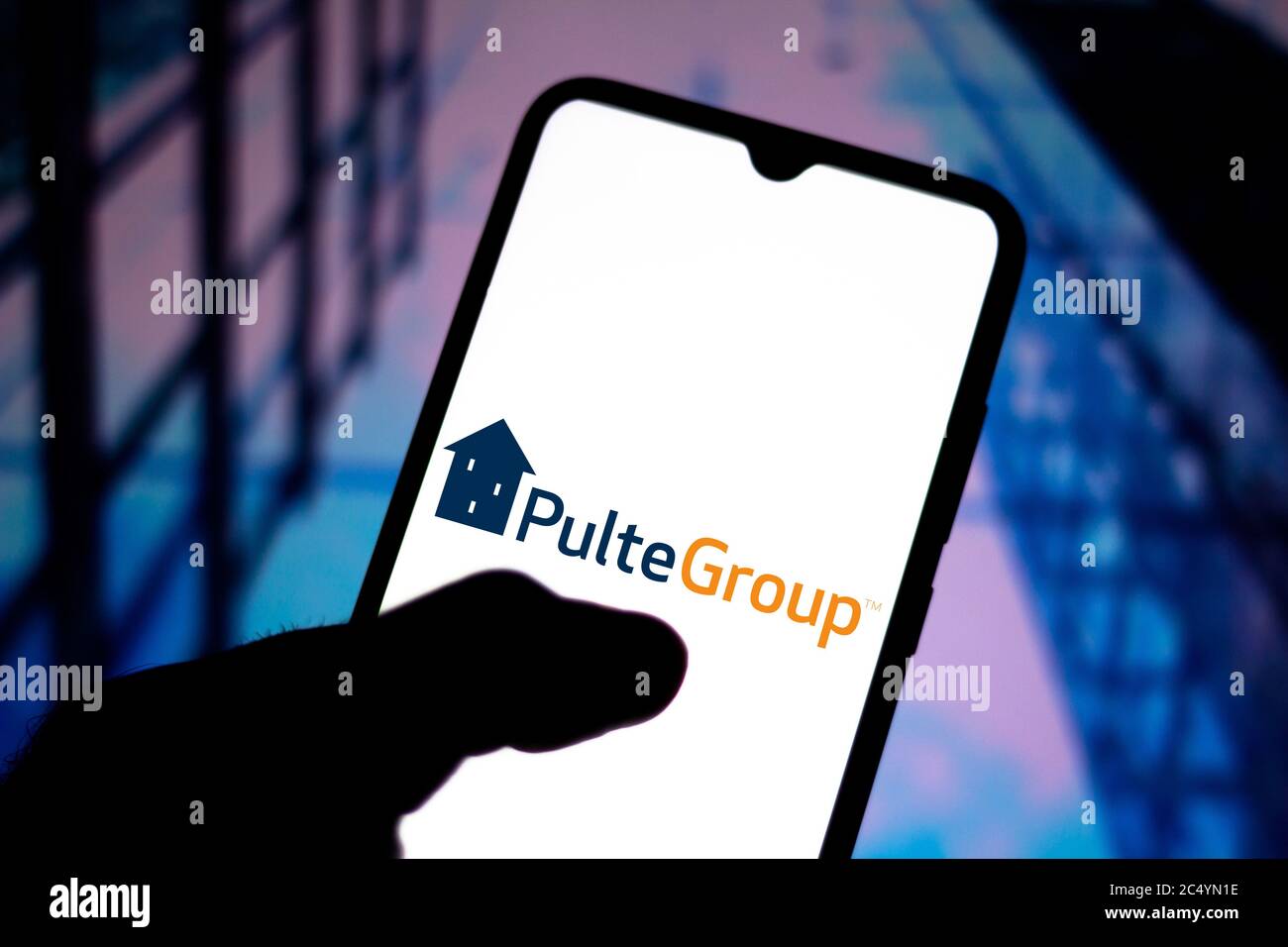 In this photo illustration the PulteGroup logo seen displayed on a ...