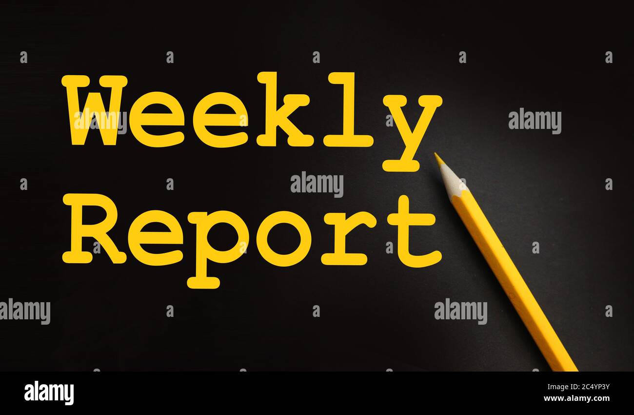 Weekly Report words printed in yellow on black with yellow pencil ...