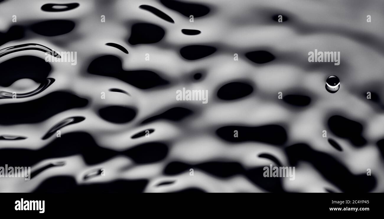 Movement of water - Abstract Black Background Liquid Texture. liquid ...