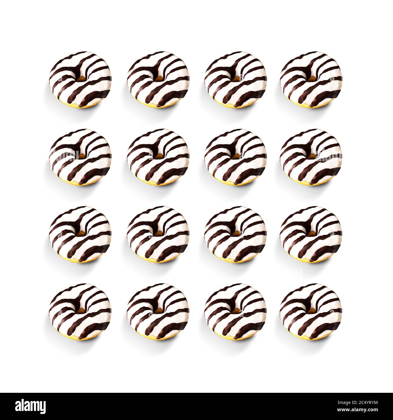 Glazed striped donuts on white background. Party food concept with copy ...