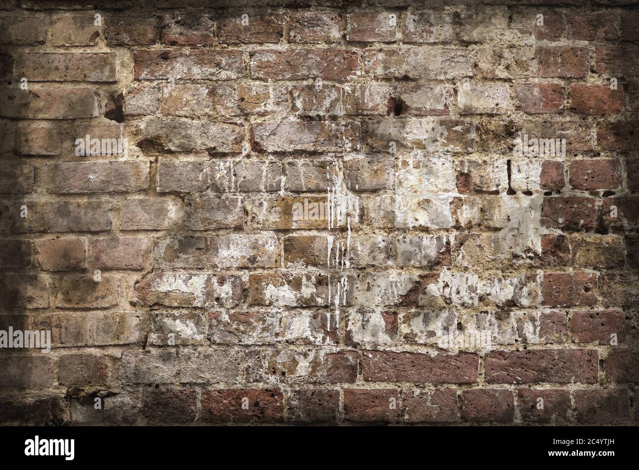 Aged and weathered old brick wall texture in a vintage retro design ...