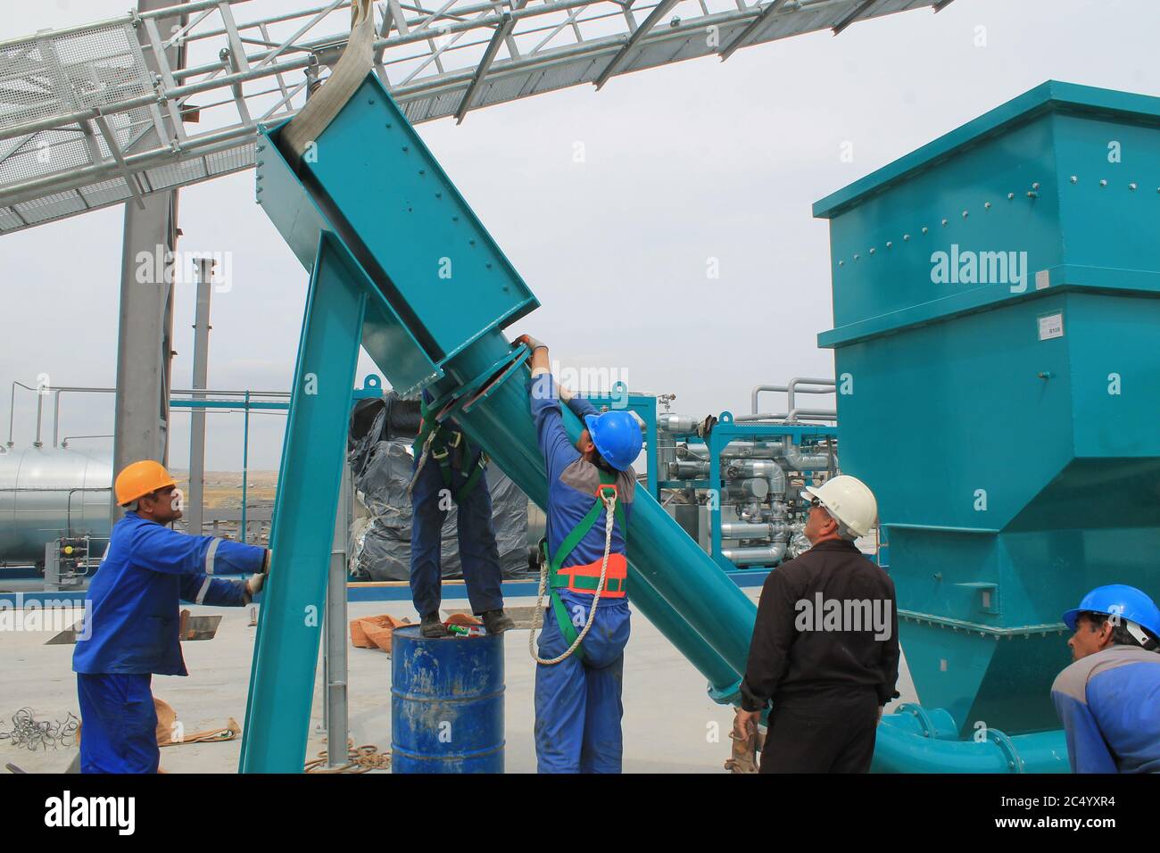 Oil pipes in a petrochemical plant during the production of oil and gas ...