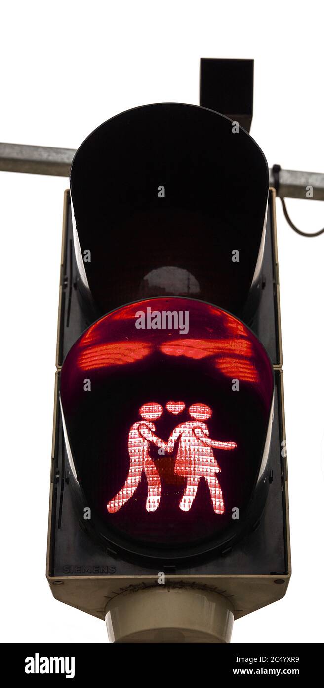 Lovely pedestrian traffic lights. Couple holding hands, red light ...