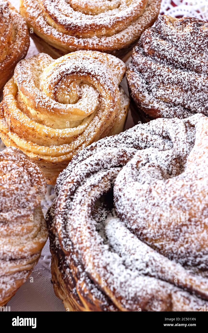 Homemade modern cruffin cake, yeast rolled cinnamon bun sprinkled ...