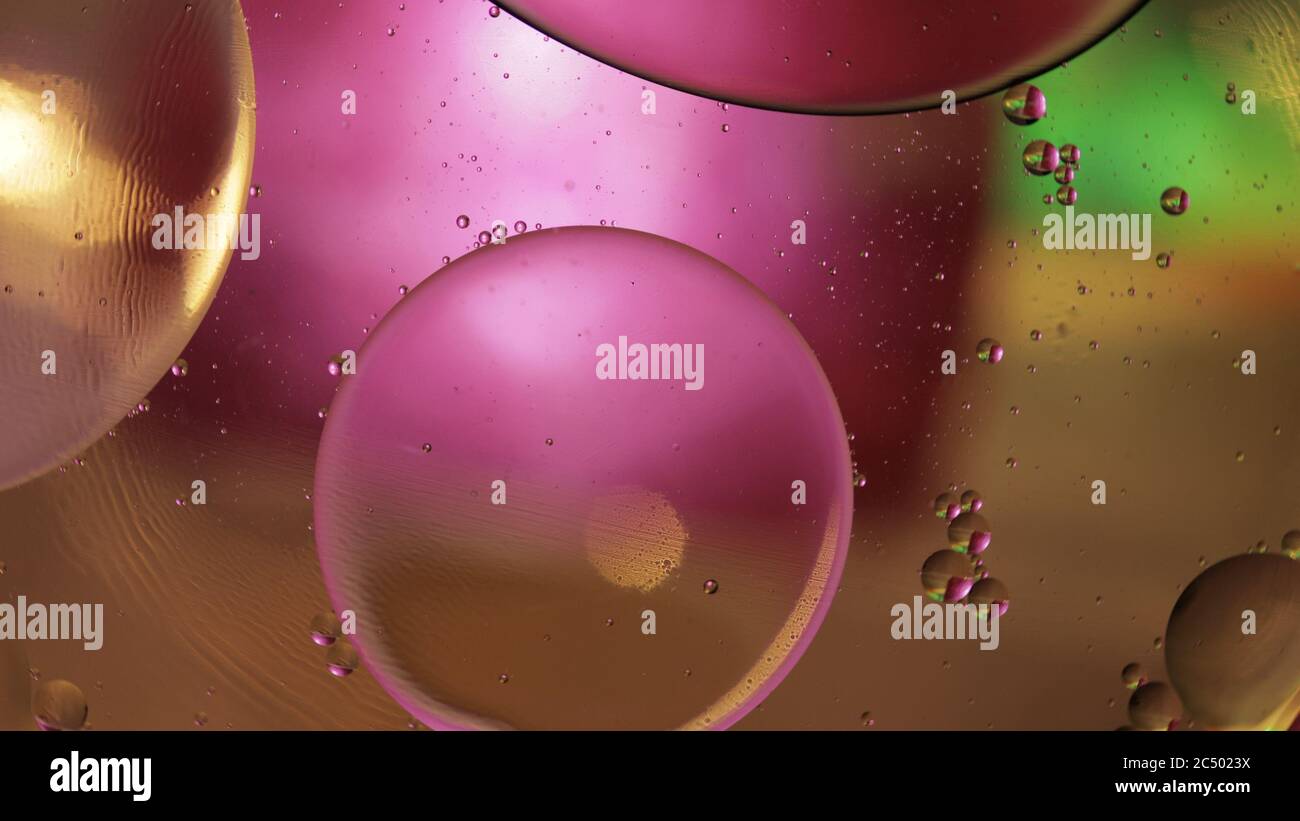 Fantastic structure of colorful oil bubbles. Chaotic motion. Abstract ...