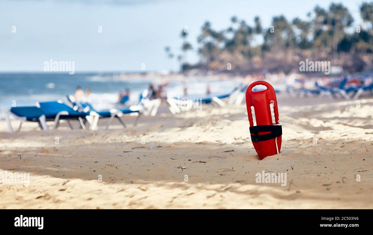 Lifeguard standing in the sand. lifeguard float Stock Photo - Alamy