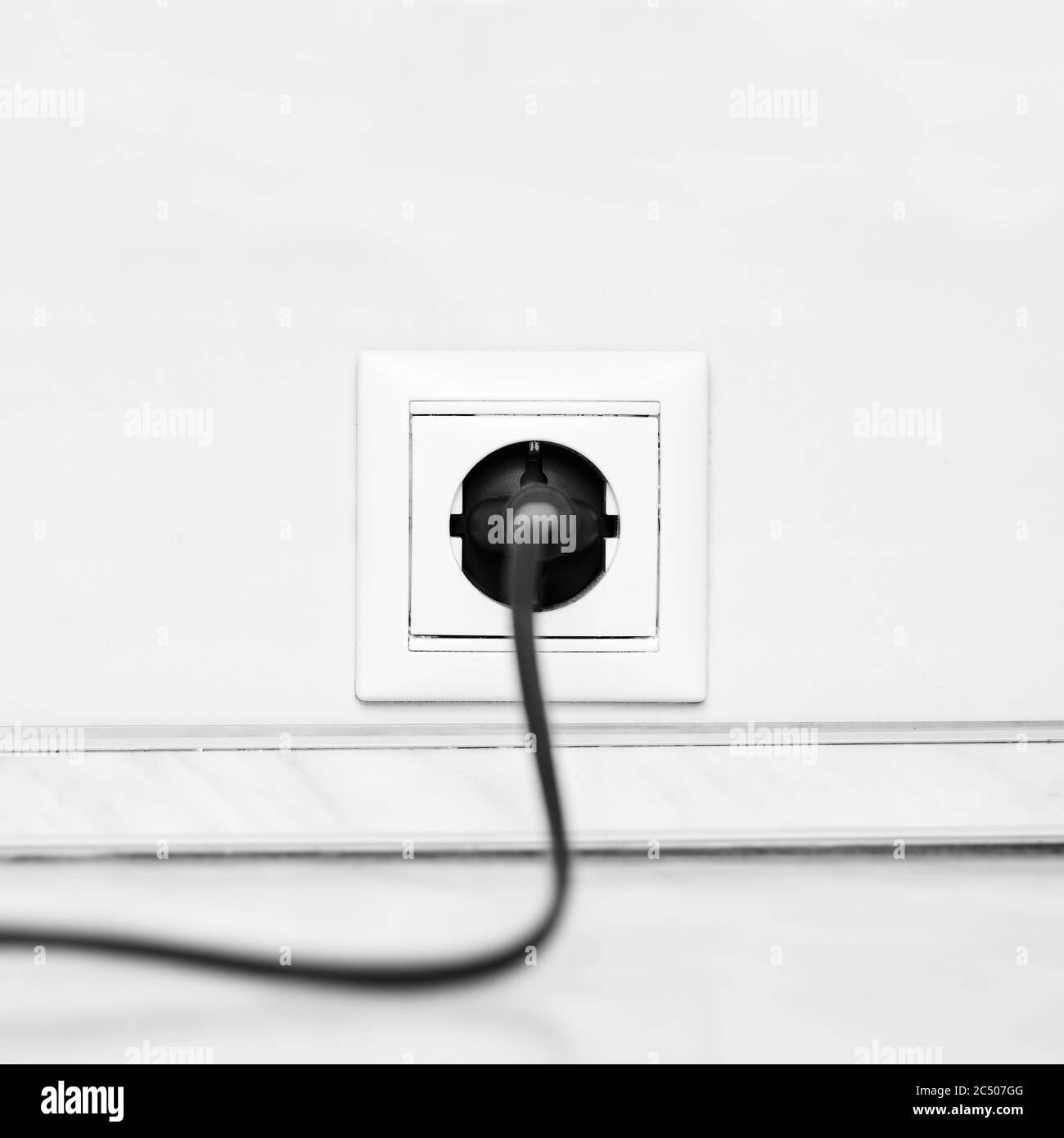 Ac power plug wall Black and White Stock Photos & Images - Alamy