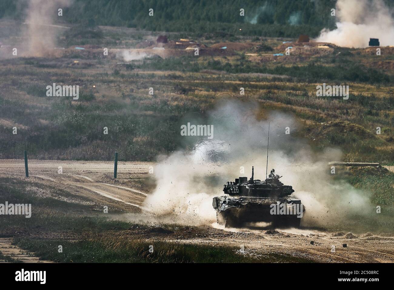 Shot from a tank. Russian tank shot on range. Smoke, explosions ...