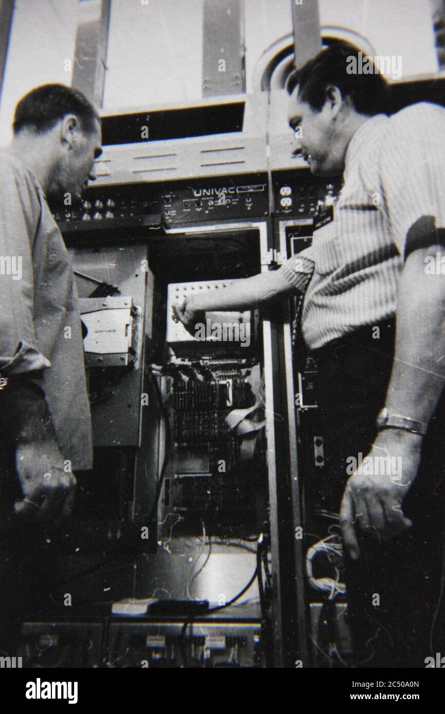 Fine 70s vintage black and white photography of two men discussing ...