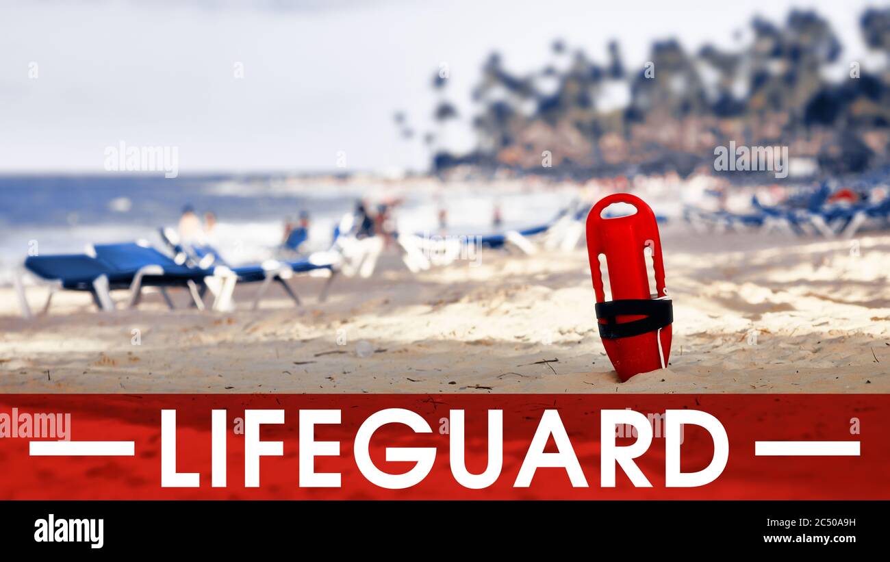 Lifeguard standing in the sand. lifeguard float. Rescue on water Stock ...