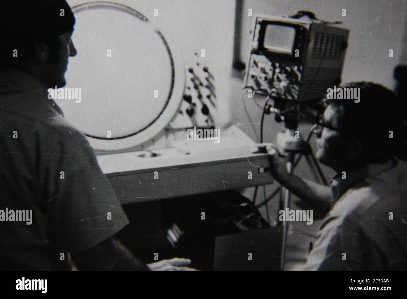 Fine 70s vintage black and white photography of two men discussing ...