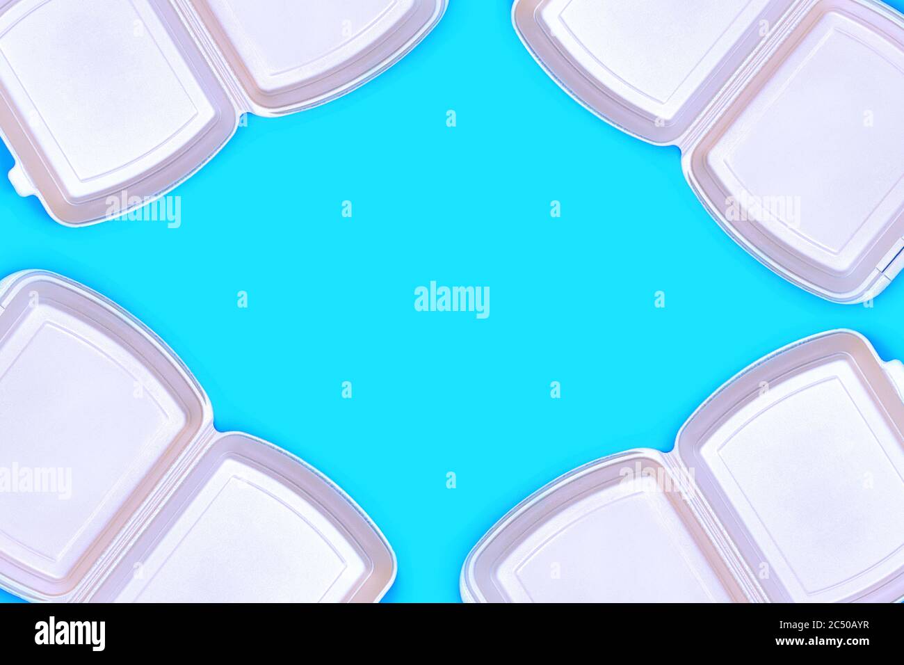 Pattern made of food delivery package or lunch box on pastel blue color ...