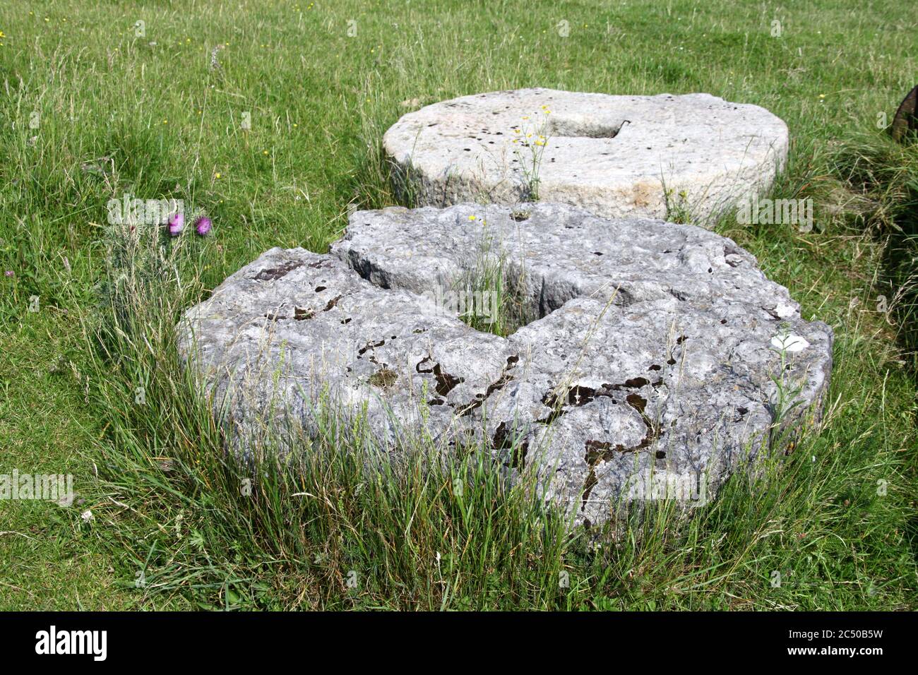 Old stone wheels at Magpie Mine near Sheldon village in the Peak ...