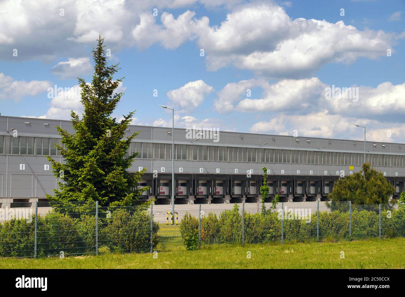 Place loading and unloading trucks. Distribution centre Stock Photo - Alamy