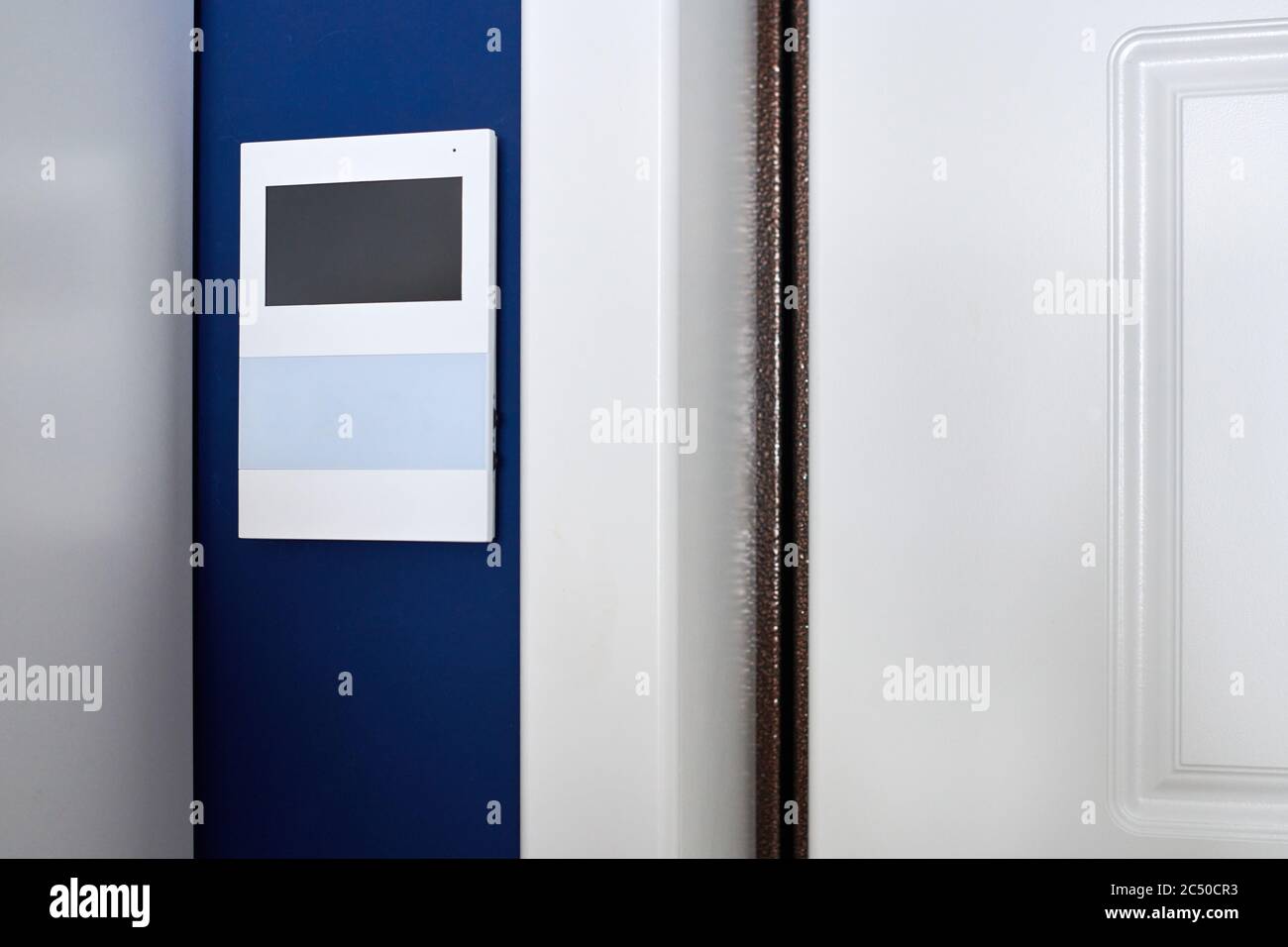 Video intercom on wall. Video door phone. Modern minimalistic sensor ... Video intercom on wall. Video door phone. Modern minimalistic sensor ...