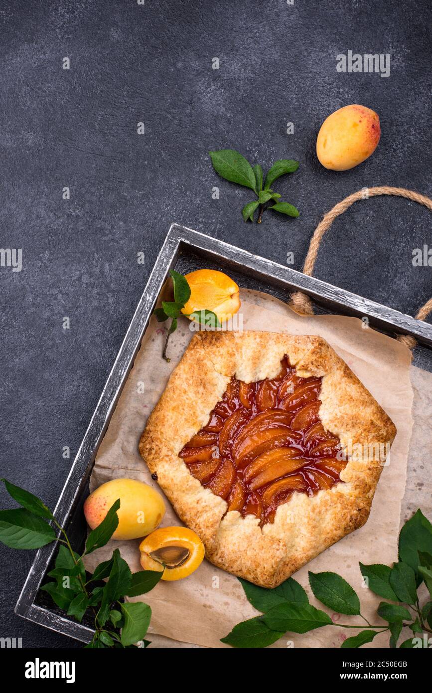 Sweet homemade galette pie with apricots Stock Photo - Alamy
