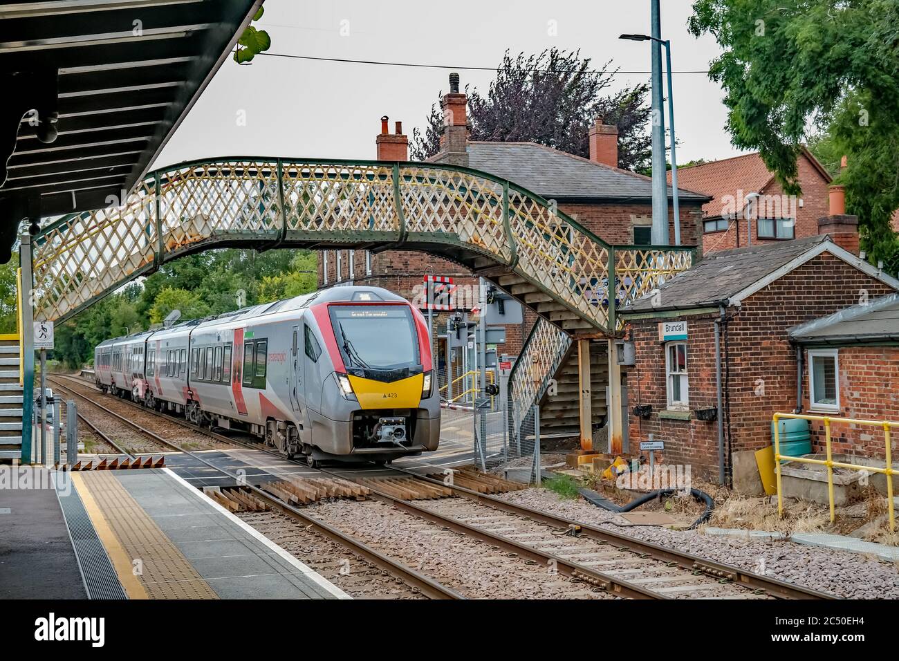 Greater Anglia train departing from Brundall Gardens rail station ...