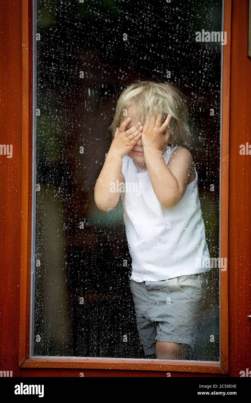 Children window raindrops hi-res stock photography and images - Alamy