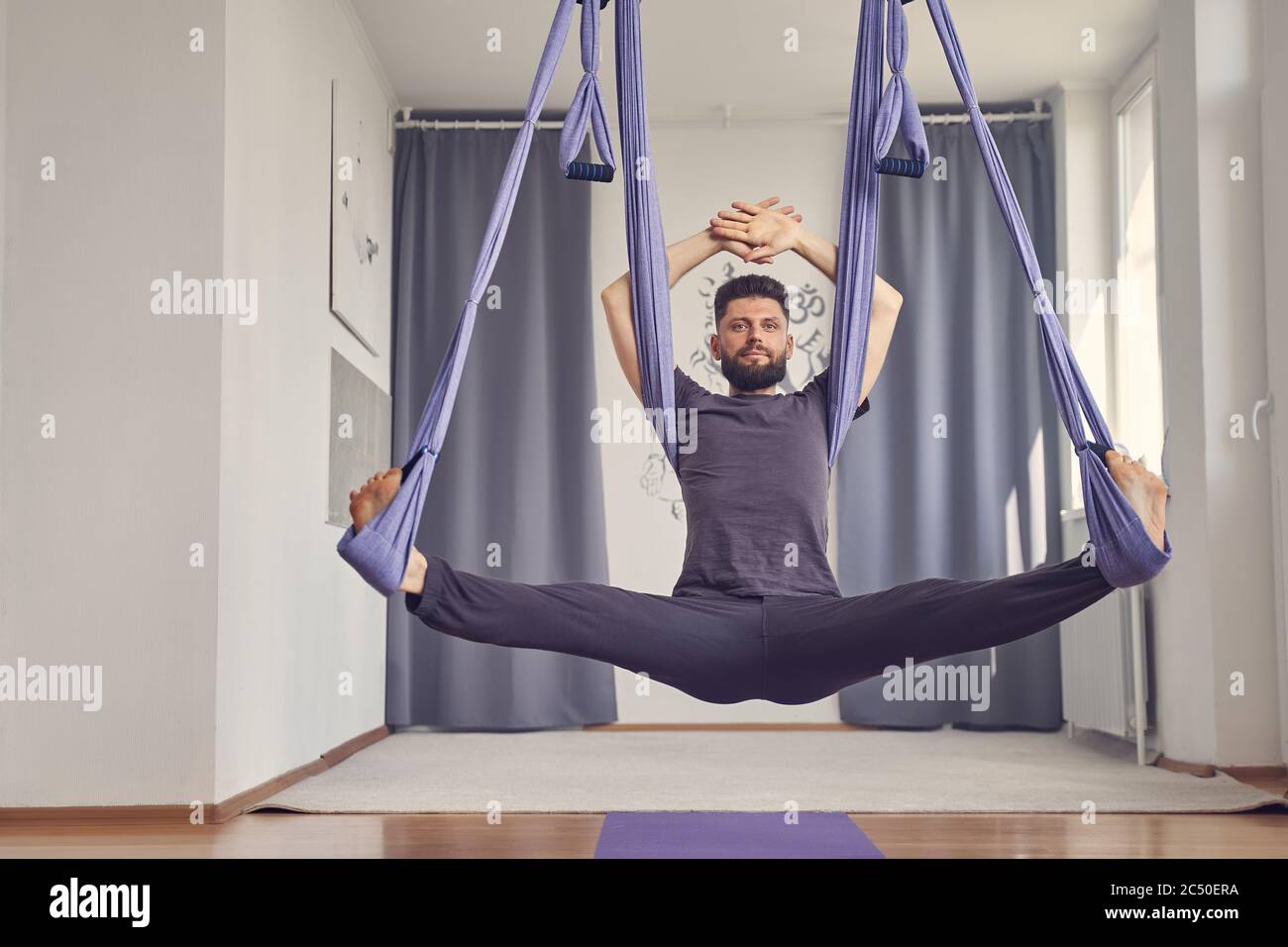 Aerial yoga session hi-res stock photography and images - Alamy