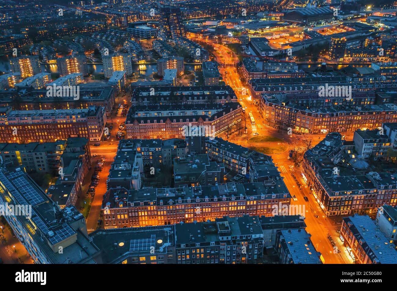 Beautiful aerial view of night Amsterdam city from above, old buildings ...