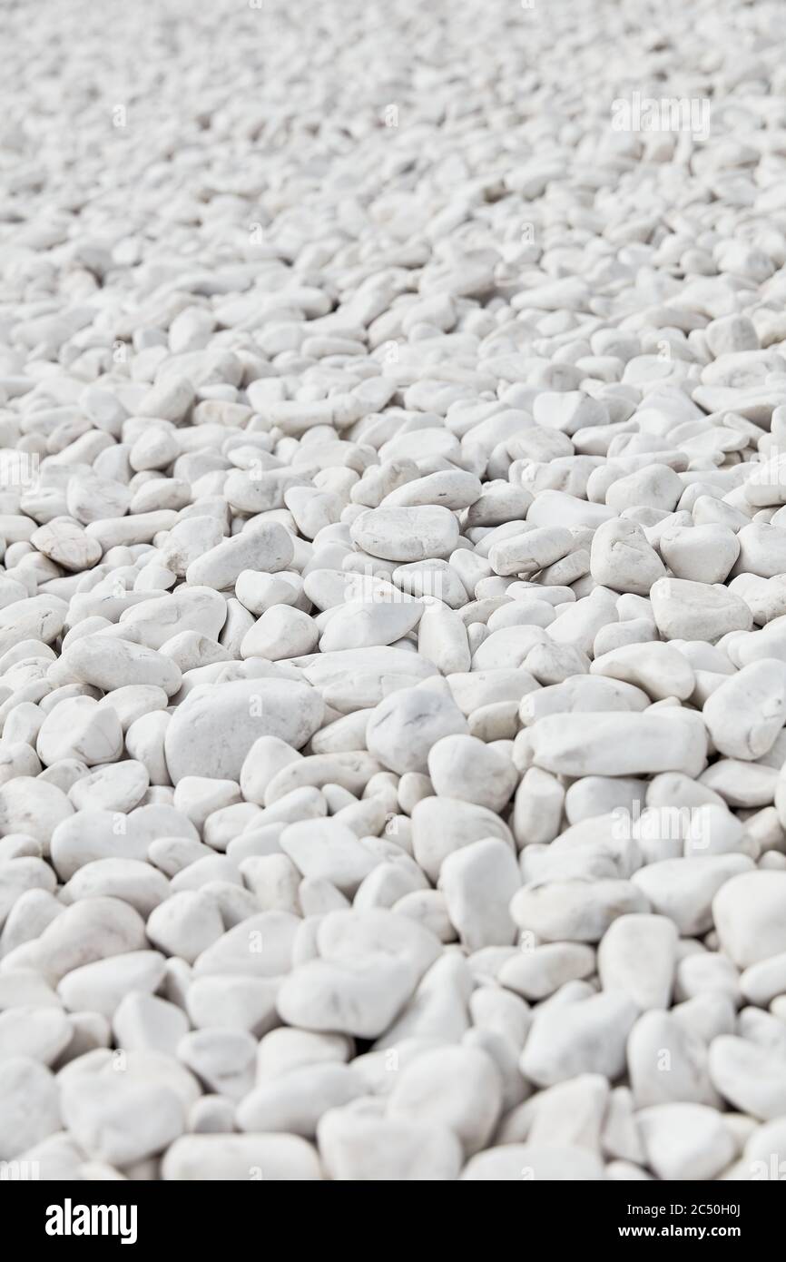 White pebbles stone background. Relaxation, meditation and calmness ...