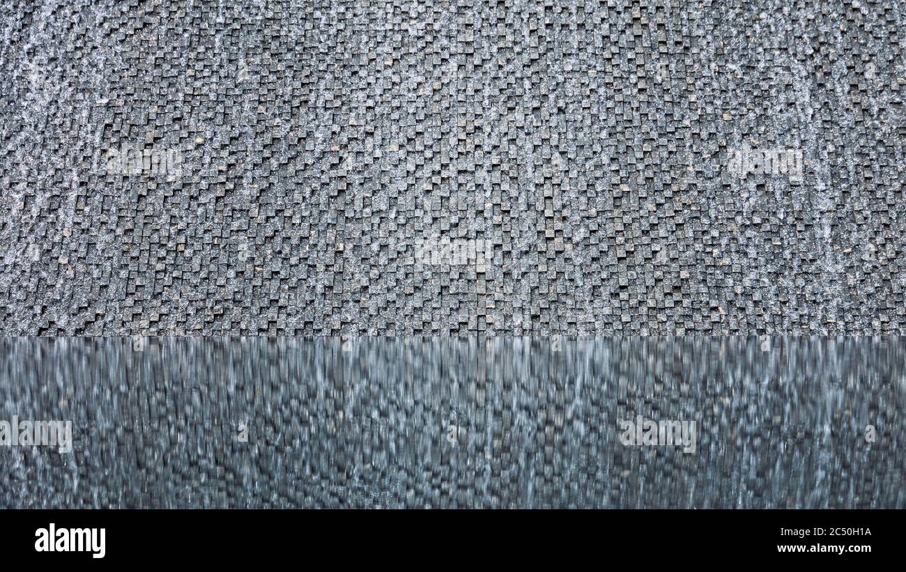 Water fall on stone wall Stock Photo - Alamy