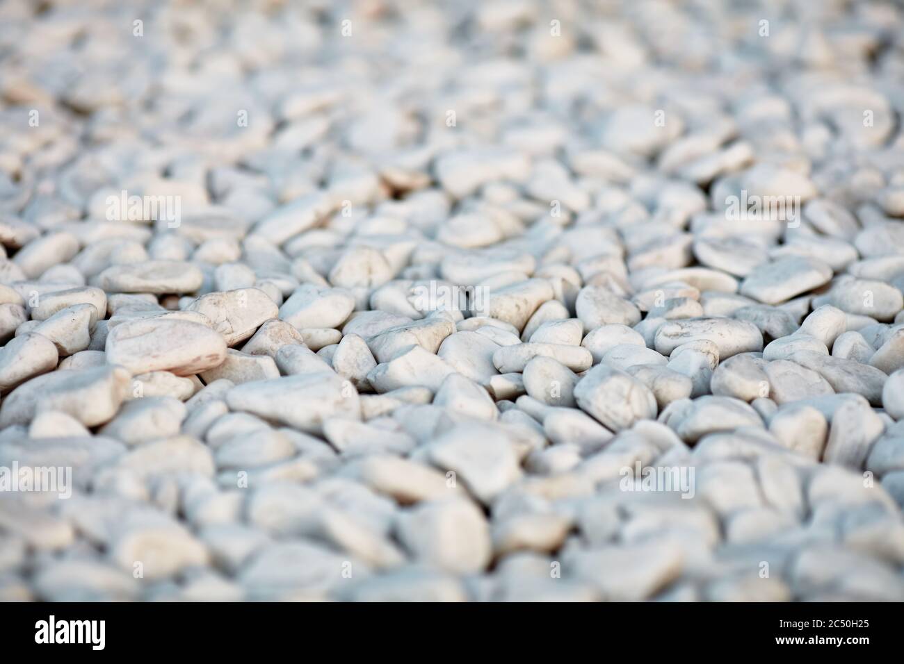 White pebbles stone background. Relaxation, meditation and calmness ...