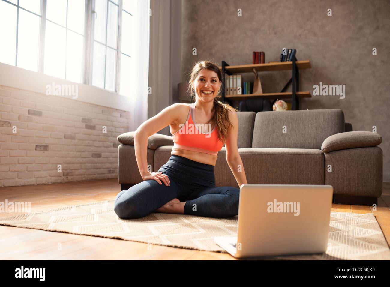 Girl stretching laptop hi-res stock photography and images - Alamy