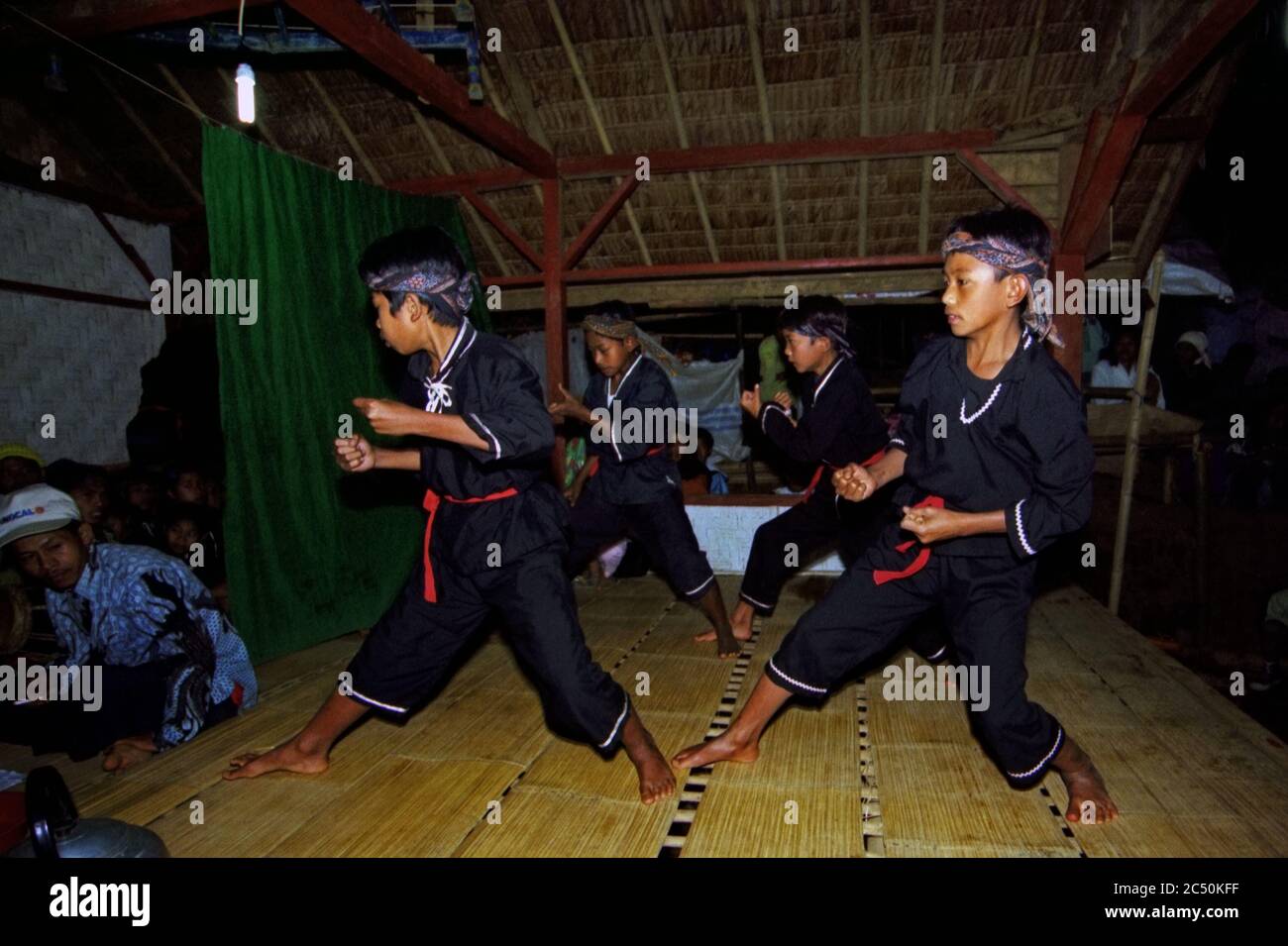 Pencak silat (Indonesian martial art) exhibition by children during ...