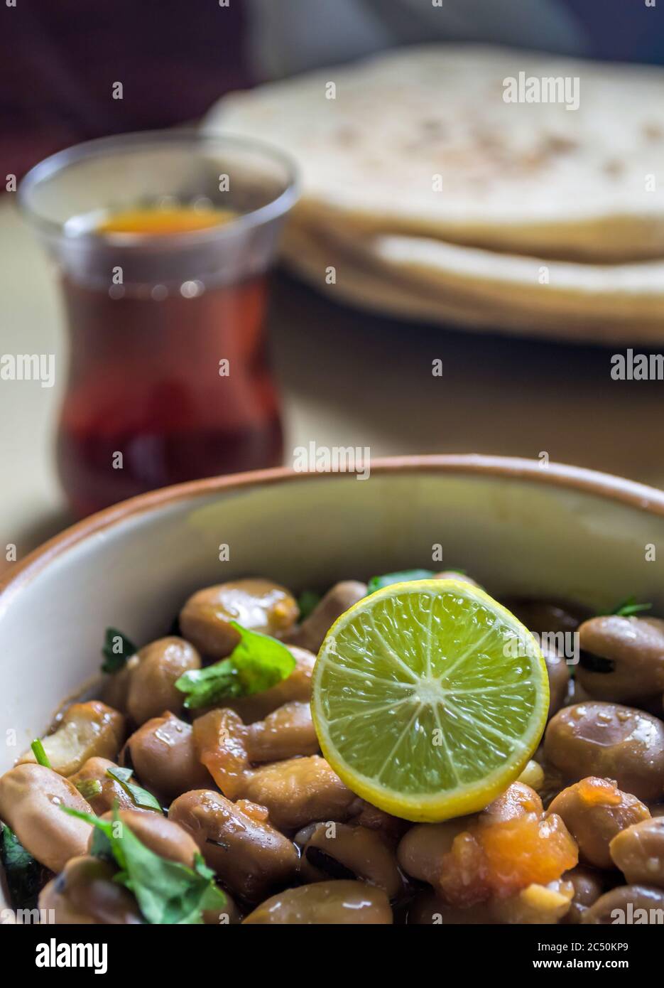 Ful Medames - Dish of Egyptian fava beans with lemon ,cumin ,vegetable ...