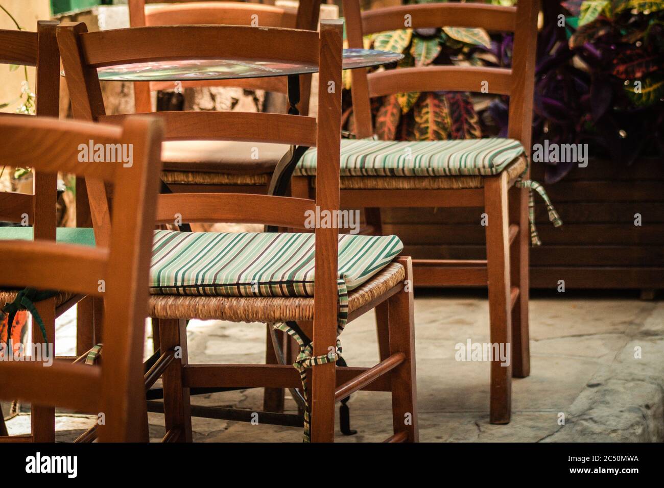 Closeup of chairs from a restaurant located in the old city of Limassol ...