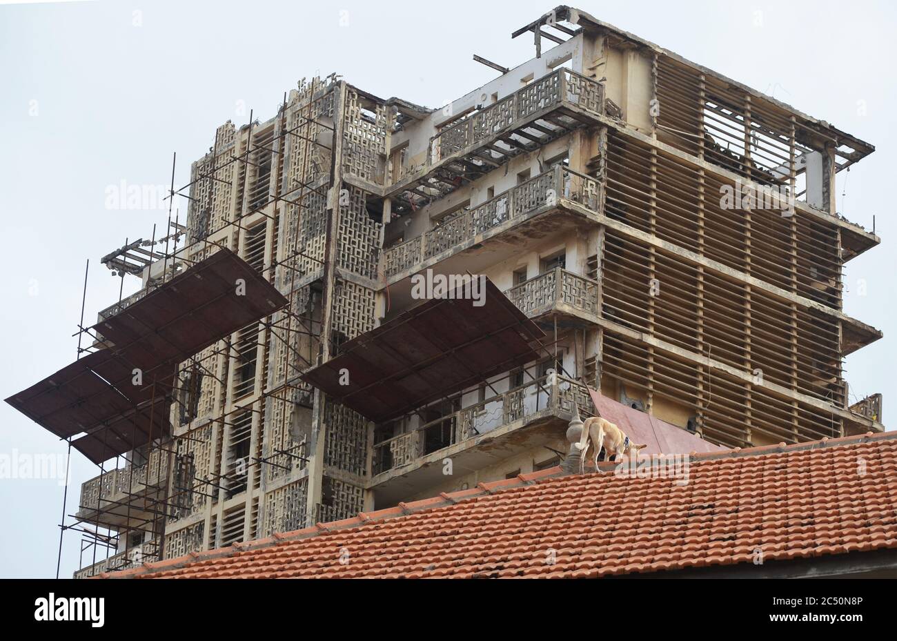 Derelict unfinished apartment block in central Dakar, Senegal Stock ...