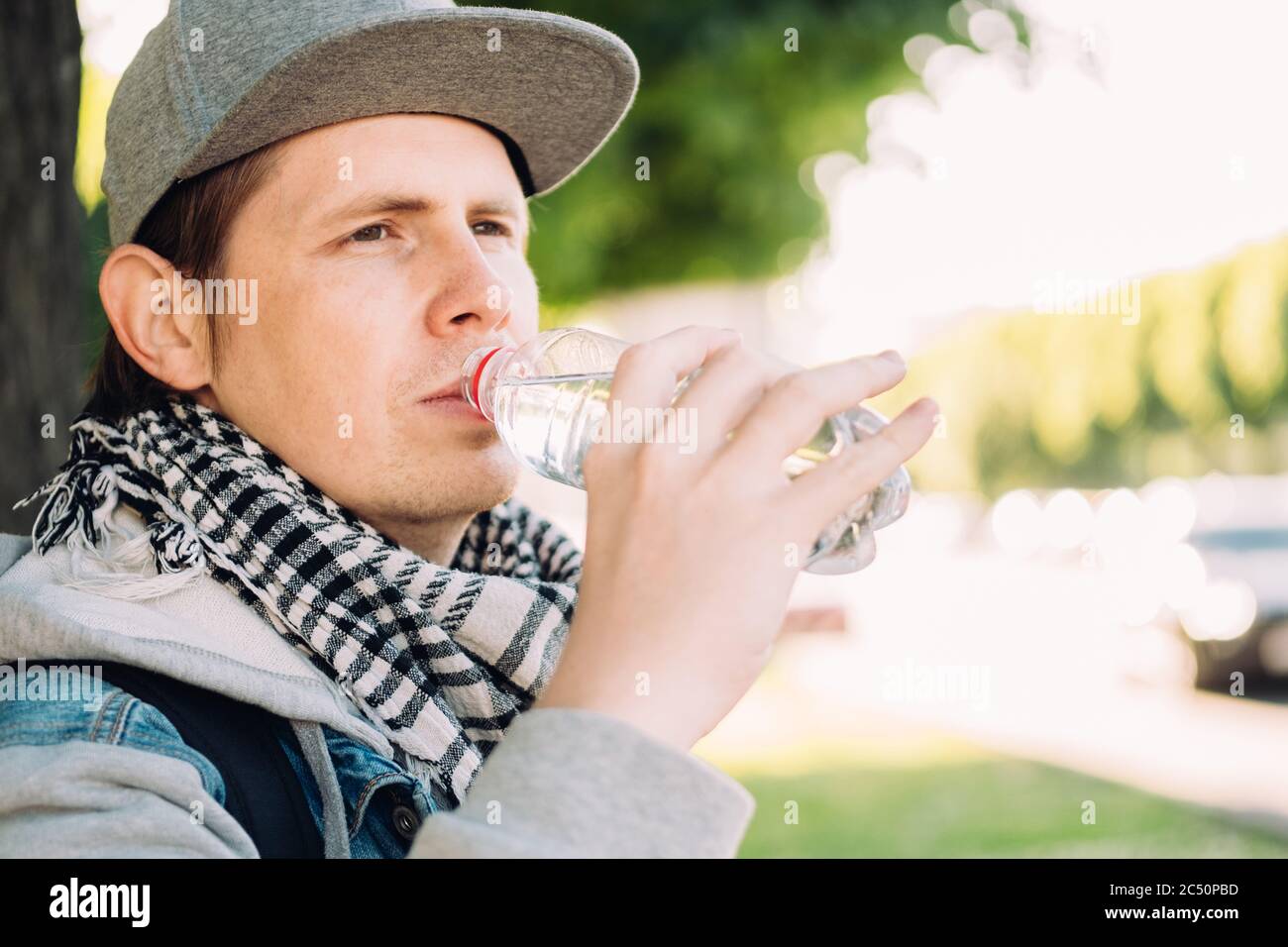 Man drinks water from bottle hi-res stock photography and images - Alamy