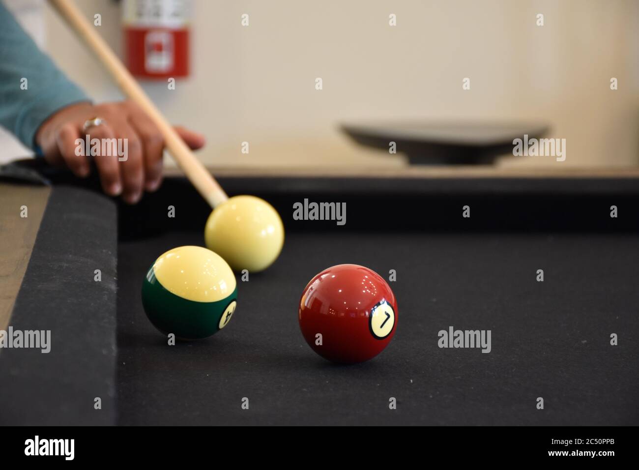 Black billiard table playing hi-res stock photography and images - Alamy