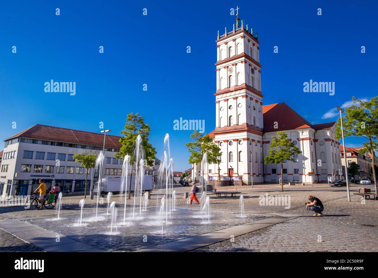 Neustrelitz, Germany. 23rd June, 2020. Water fountains splash in front ...
