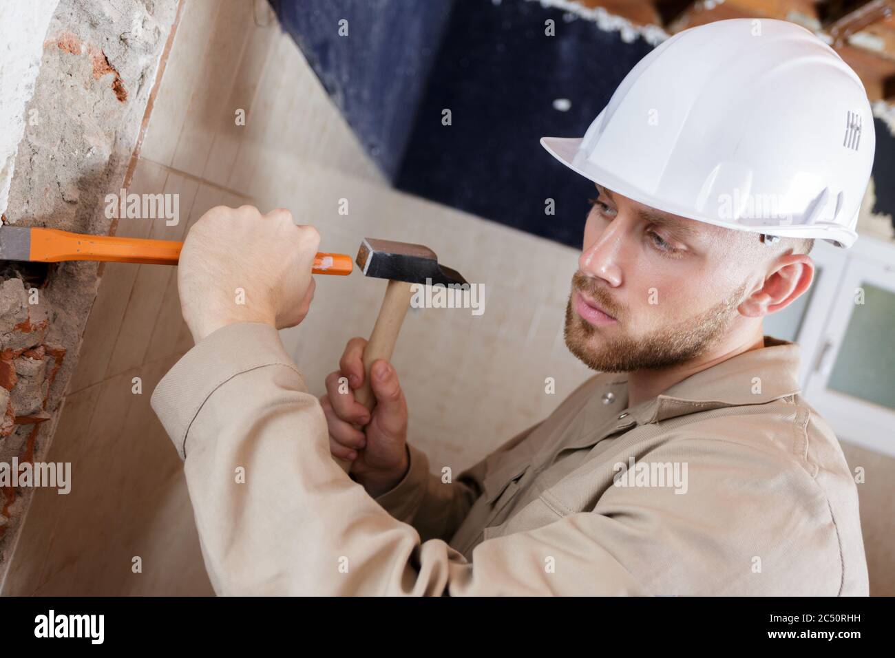 Hammer tapping hi-res stock photography and images - Alamy