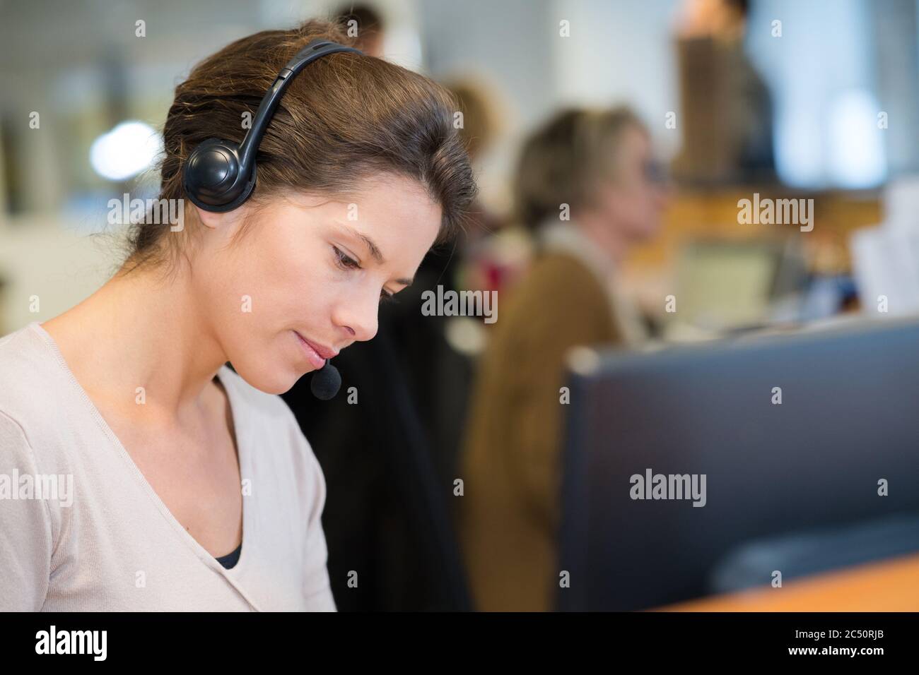 female worker with phone headset Stock Photo - Alamy