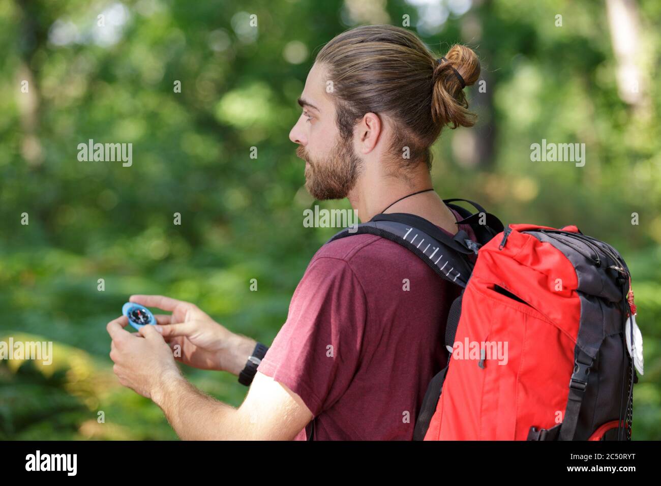 explorer traveler man with compass outdoor Stock Photo - Alamy
