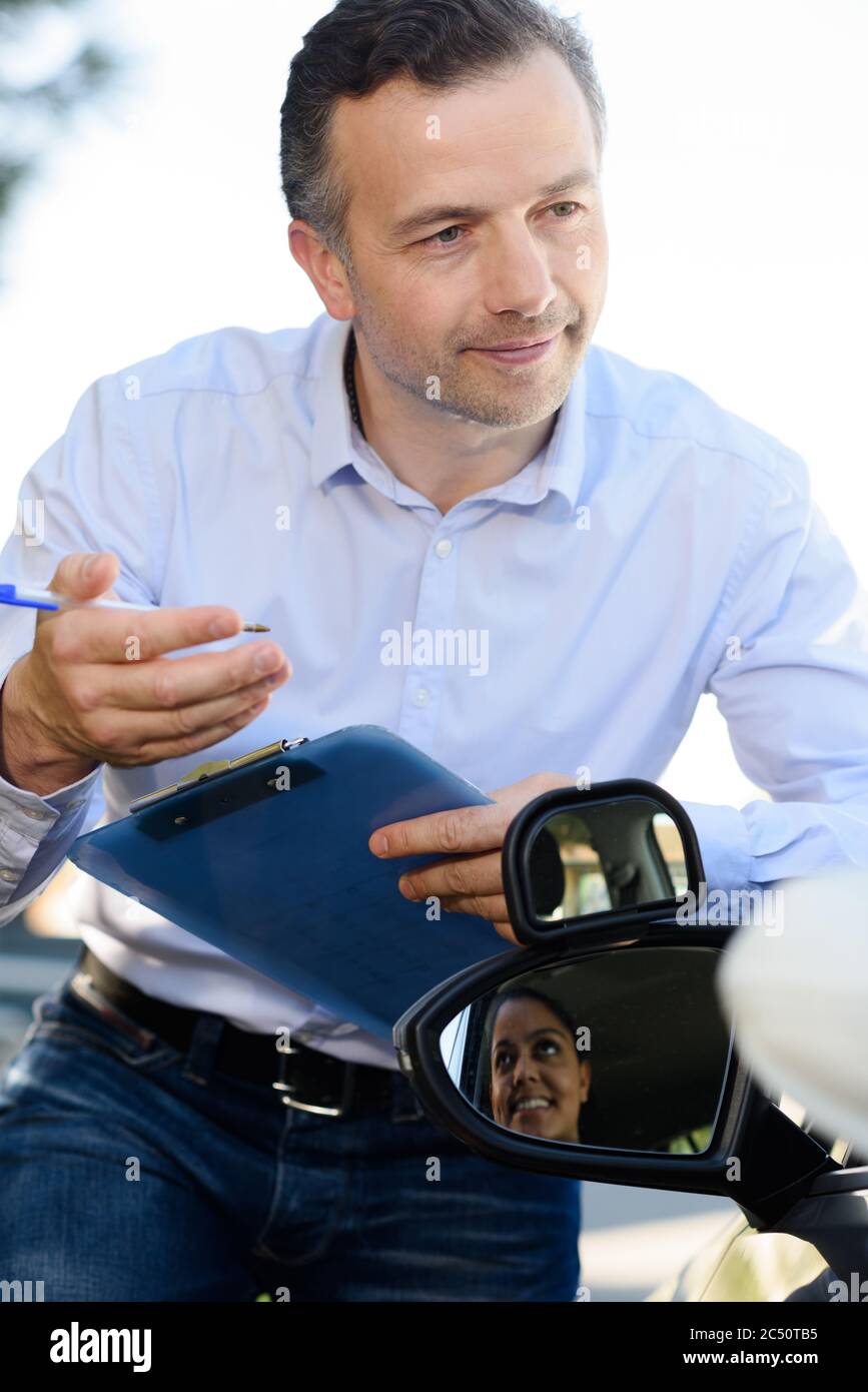 happy student driver taking driving test Stock Photo - Alamy
