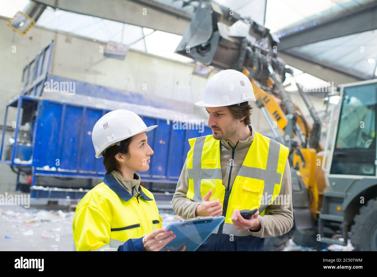 workers in landfill dumping Stock Photo - Alamy