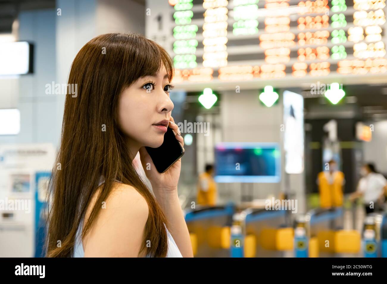Young woman at metro station waiting for the train hi-res stock ...