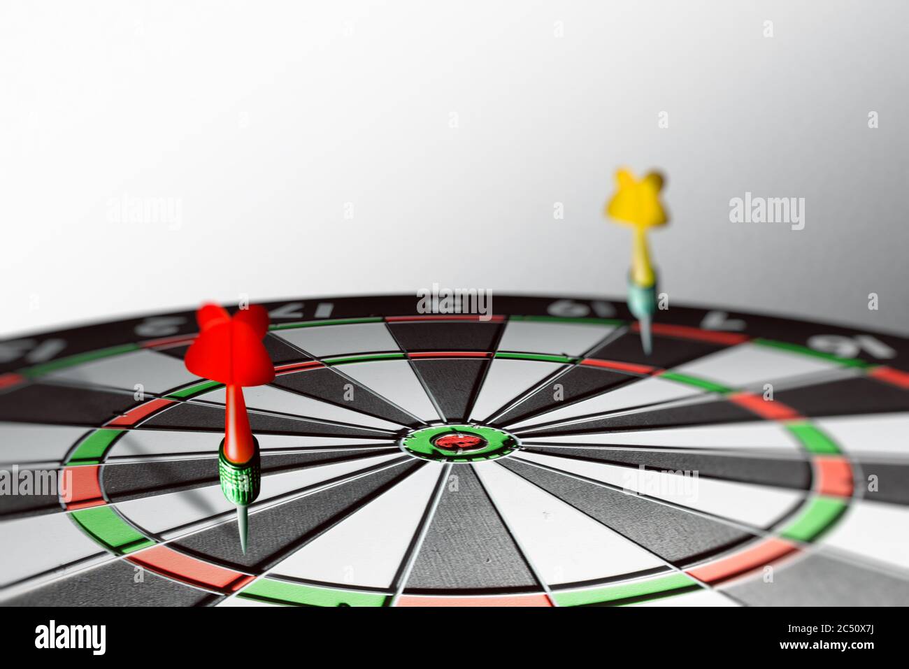 Closeup view of arrow missing the target in the darts Stock Photo - Alamy