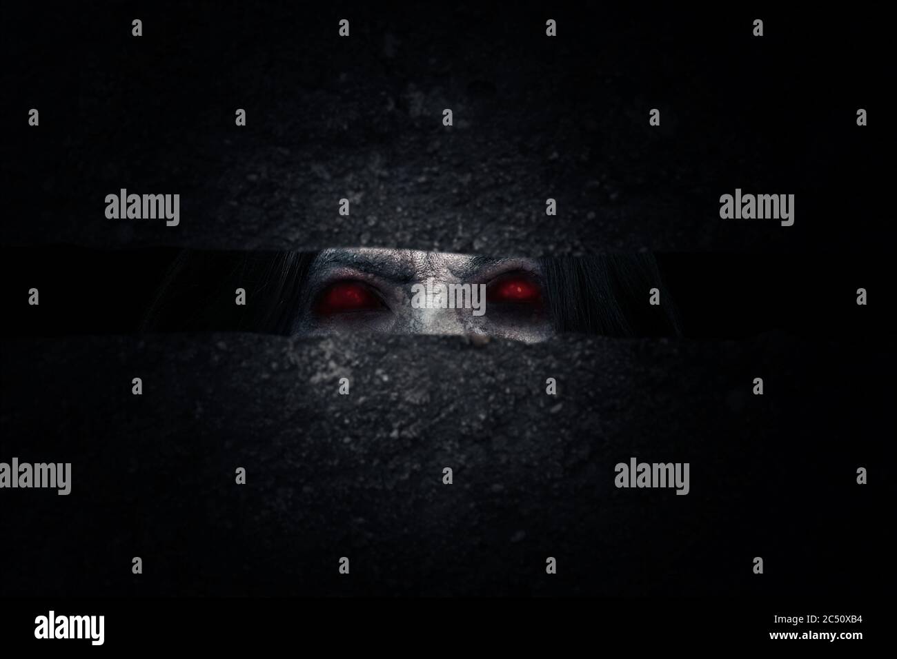 Scary zombie hiding behind the wall with dark background Stock Photo ...