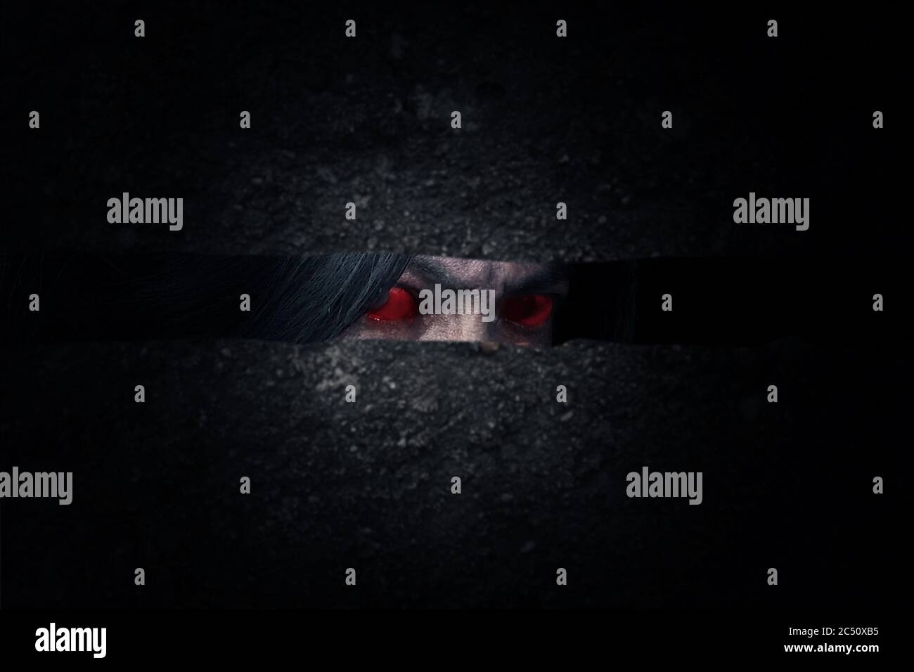 Scary zombie hiding behind the wall with dark background Stock Photo ...