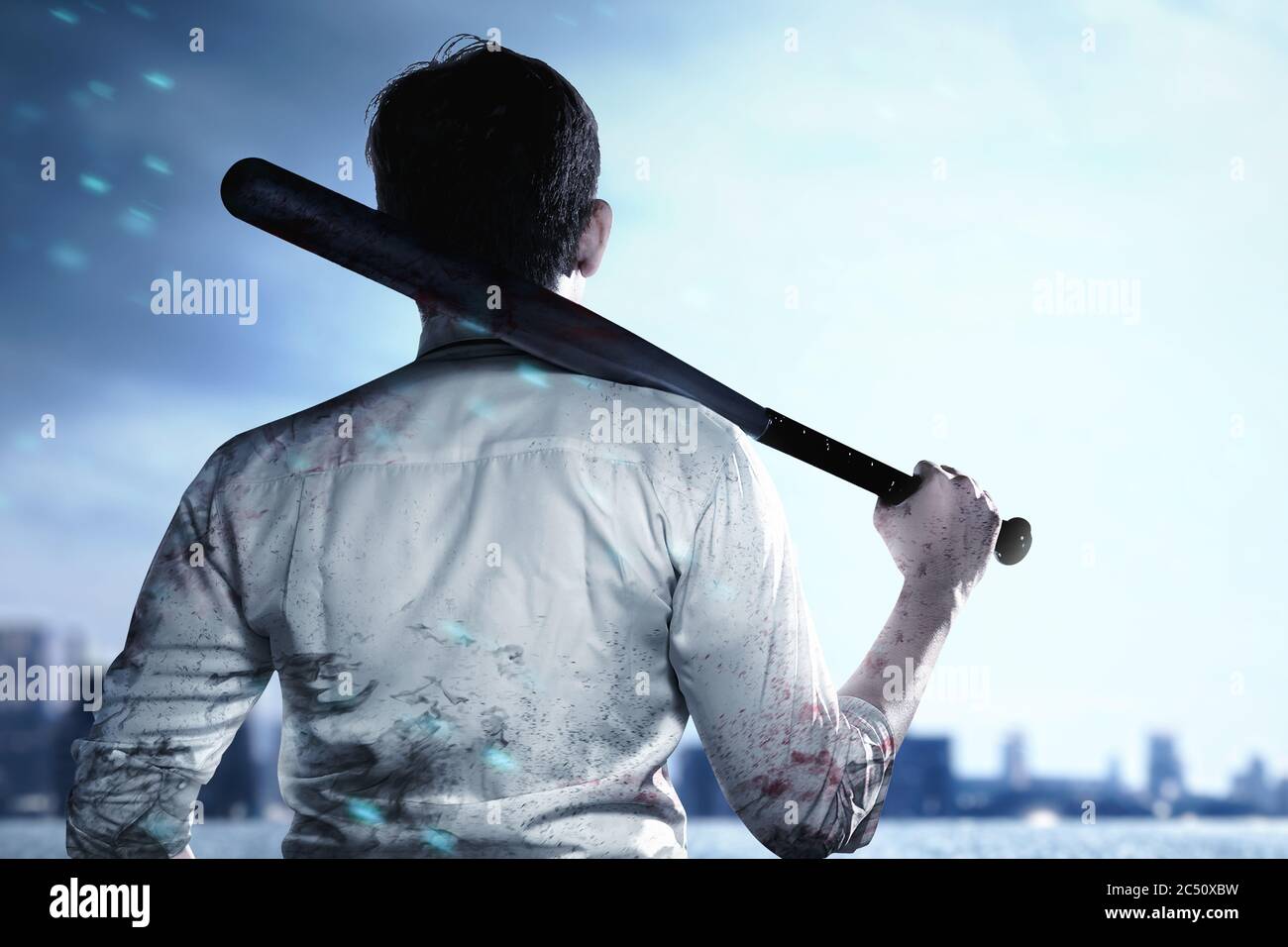 Asian man standing with a baseball bat on his hand on the city with the ...